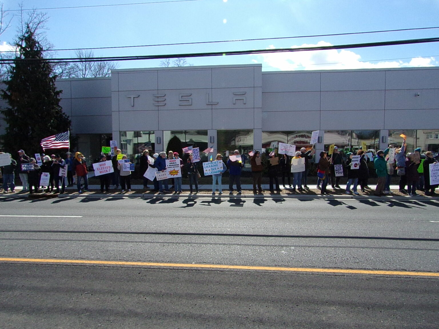 Indivisible Protests: Local Tesla Dealership Becomes Center for ...